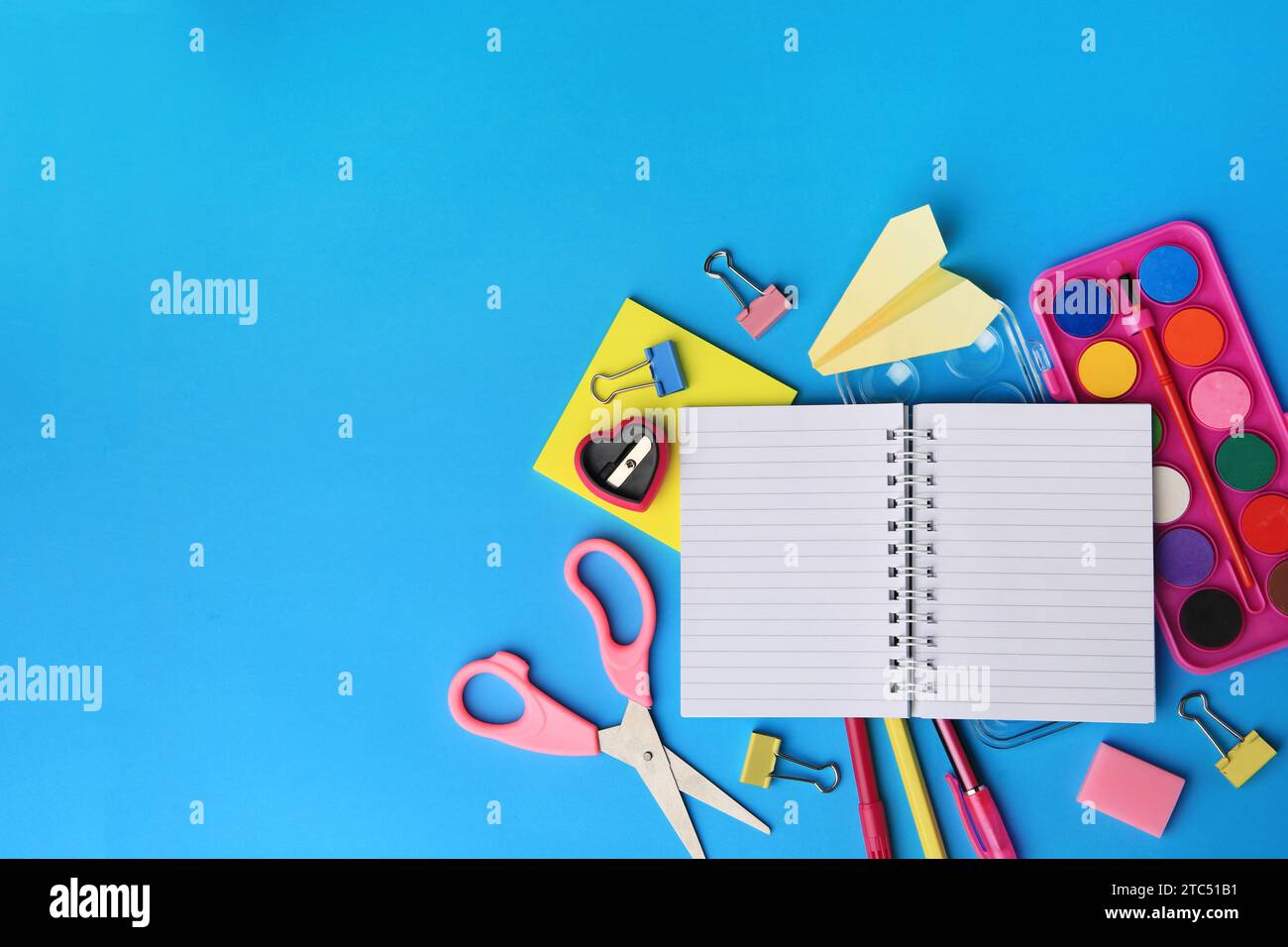Flat lay composition with blank notebook and other school stationery on ...
