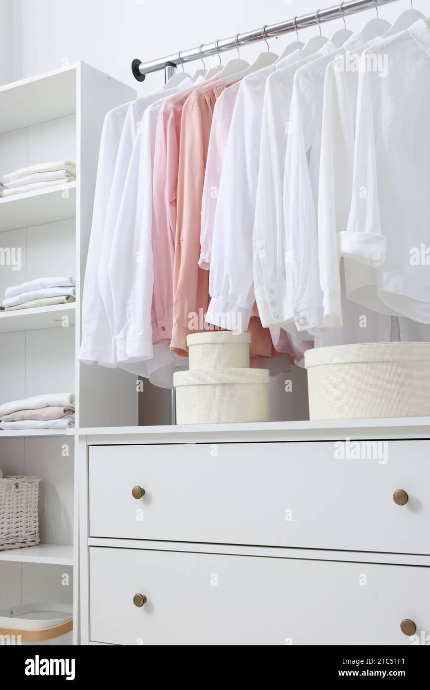 Shelving unit stylish clothes hi-res stock photography and images - Alamy