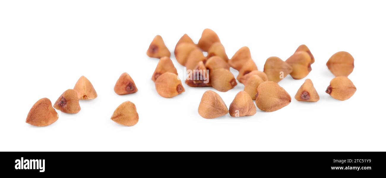 Many dry buckwheat grains isolated on white Stock Photo - Alamy