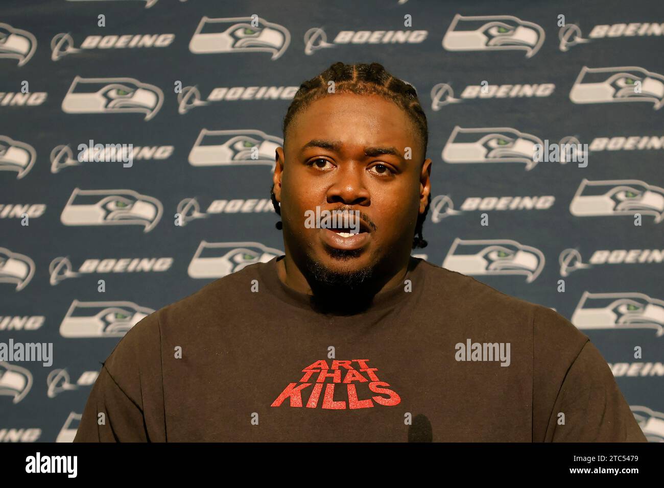 Seattle Seahawks defensive tackle Jarran Reed speaks to reporters after ...