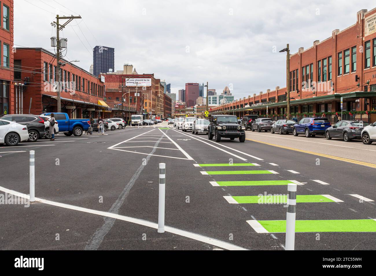Traffic and parked cars along Smallman Street in the Strip District ...
