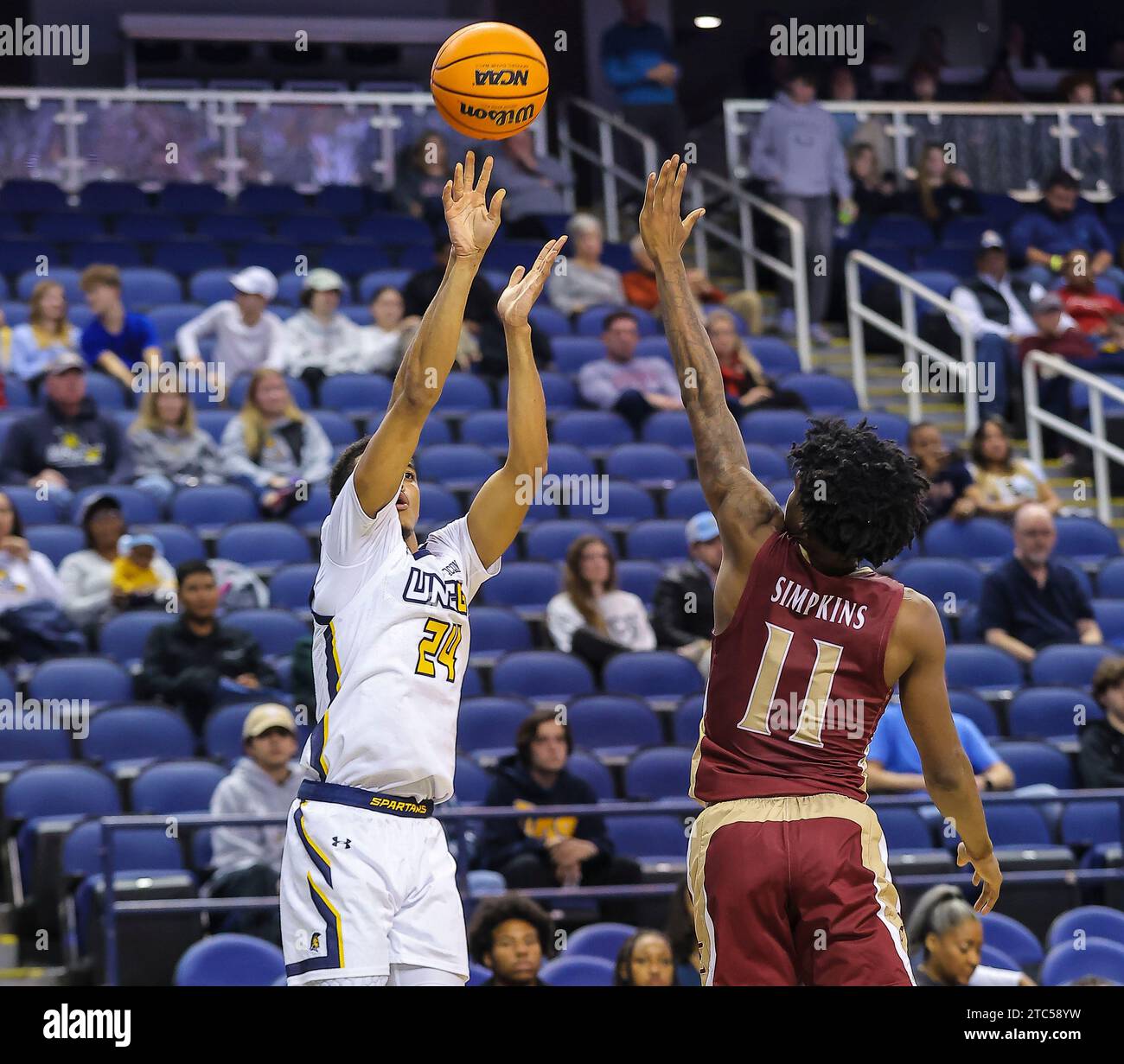 December 10, 2023: UNC""”Greensboro senior Tim Ceaser (24) shots over ...