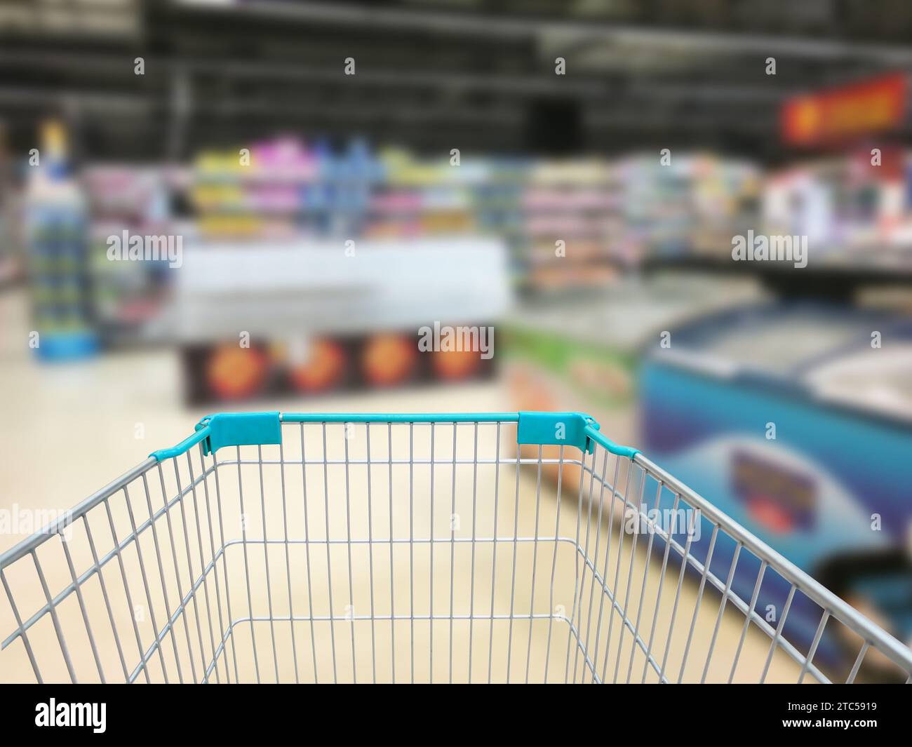 Shopping with Cart View in Supermarket blurred background Stock Photo ...