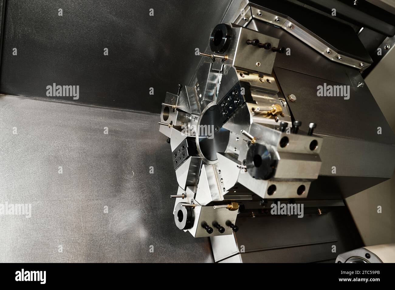 Lathe machine tool with shiny turret in production plant Stock Photo ...