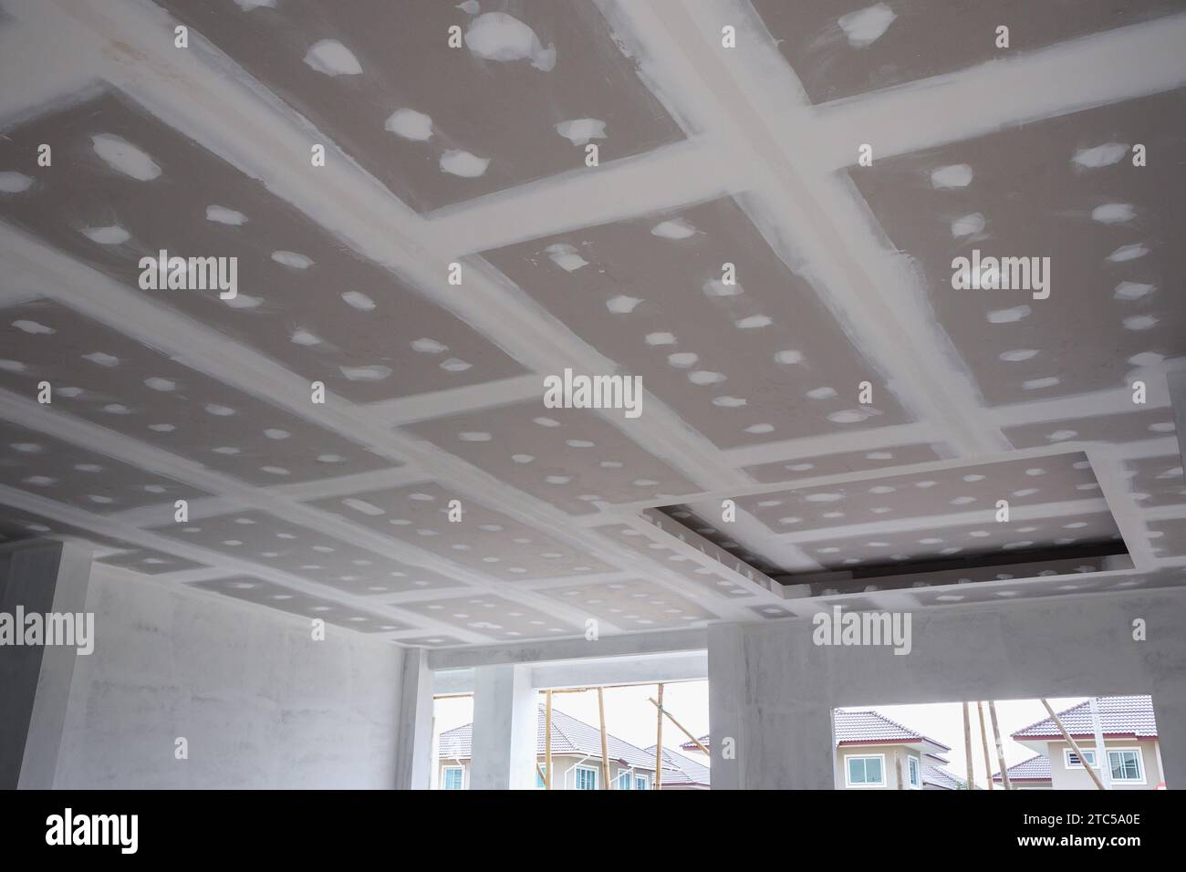 ceiling gypsum board installation at construction site Stock Photo - Alamy