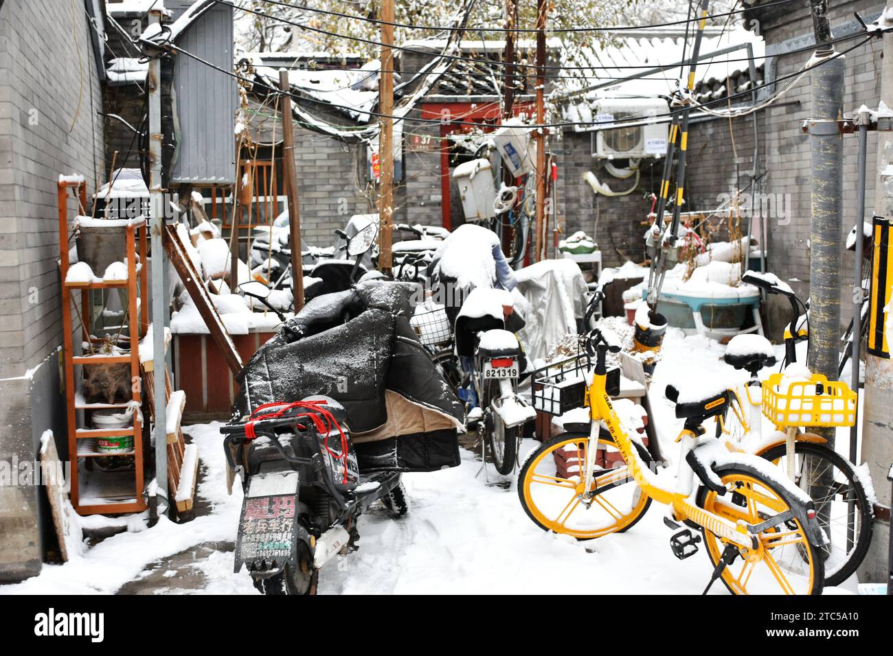 BEIJING, CHINA - DECEMBER 11, 2023 - People brave snow on Guozijian ...