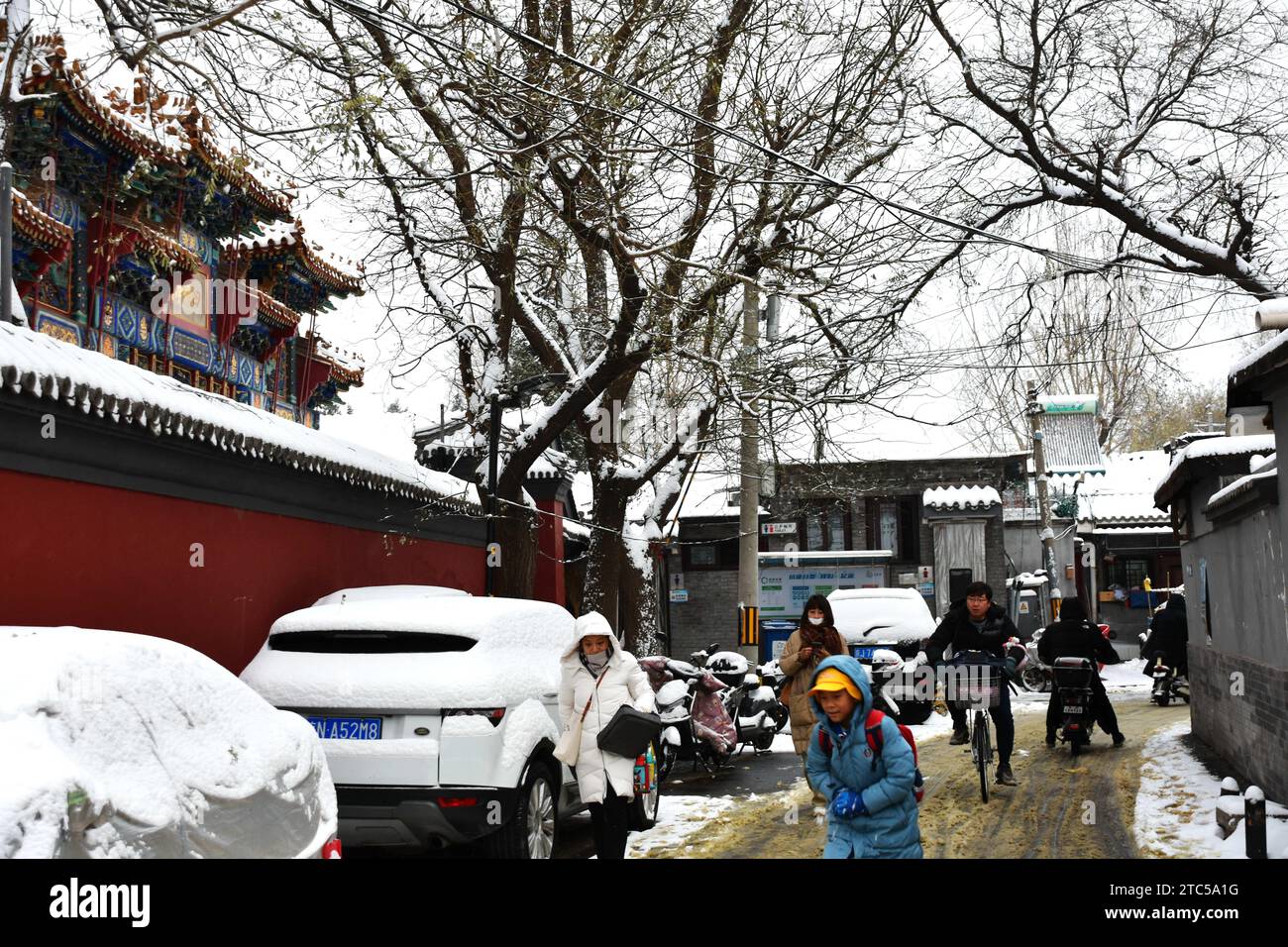 BEIJING, CHINA - DECEMBER 11, 2023 - People brave snow on Guozijian ...