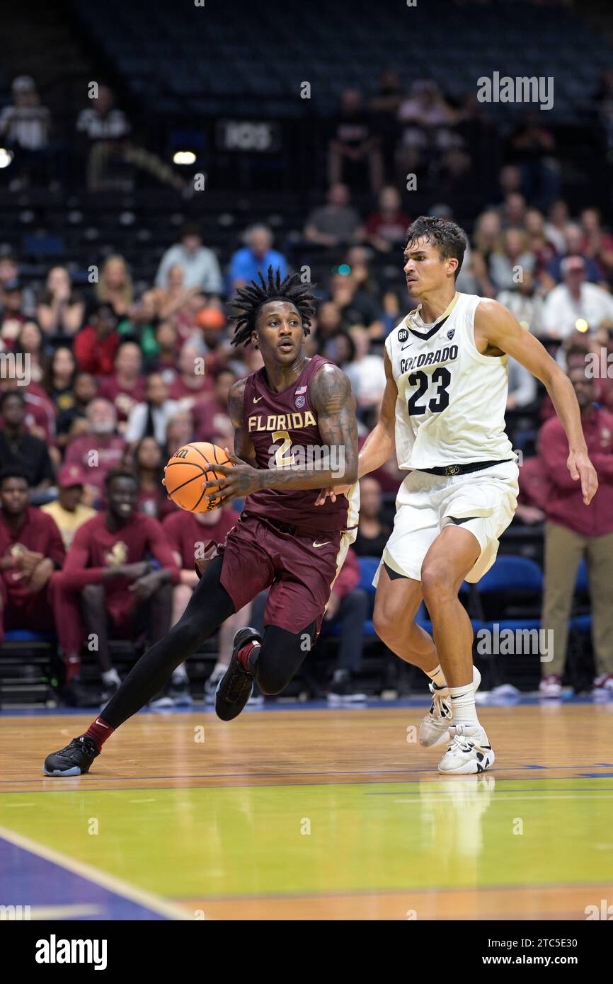 Florida State forward Jamir Watkins (2) drives to the basket past ...