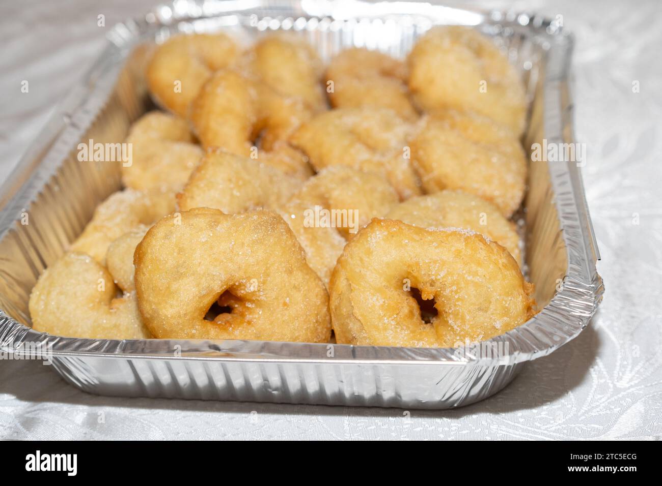Delectable Fresh Hot Donuts, Glistening with Sugar on a Disposable ...