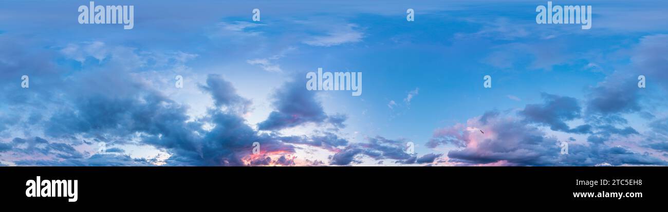 Sunset sky panorama with bright glowing pink Cumulus clouds. HDR 360 ...