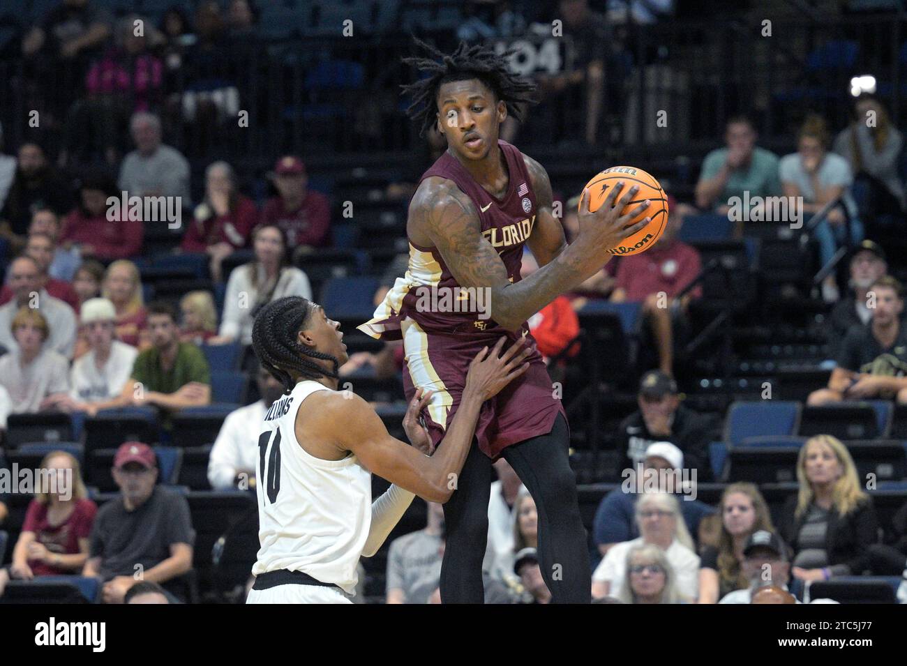 Florida State forward Jamir Watkins (2) grabs a rebound in front of ...