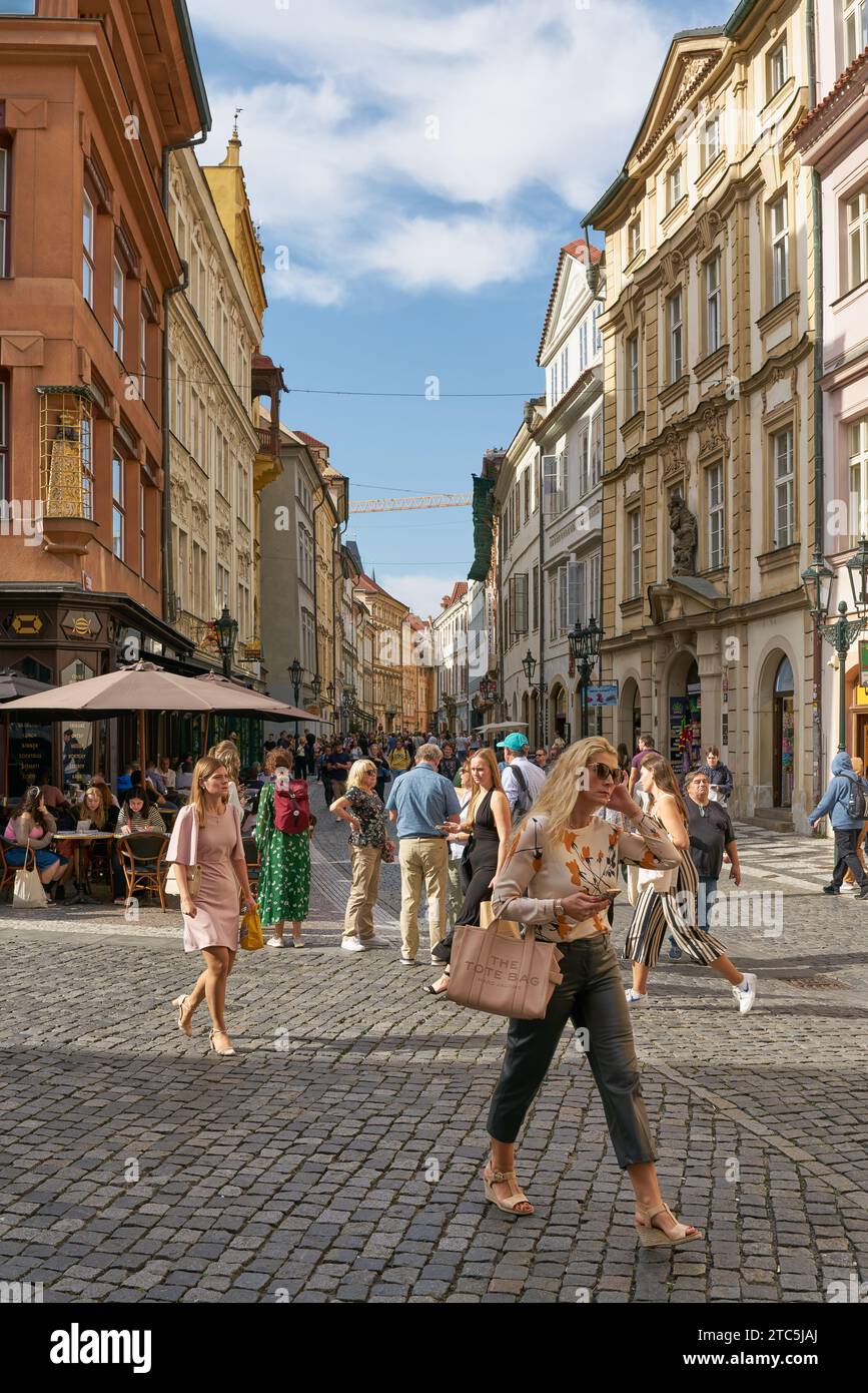 Tourists and residents in a popular shopping street in the old town of ...