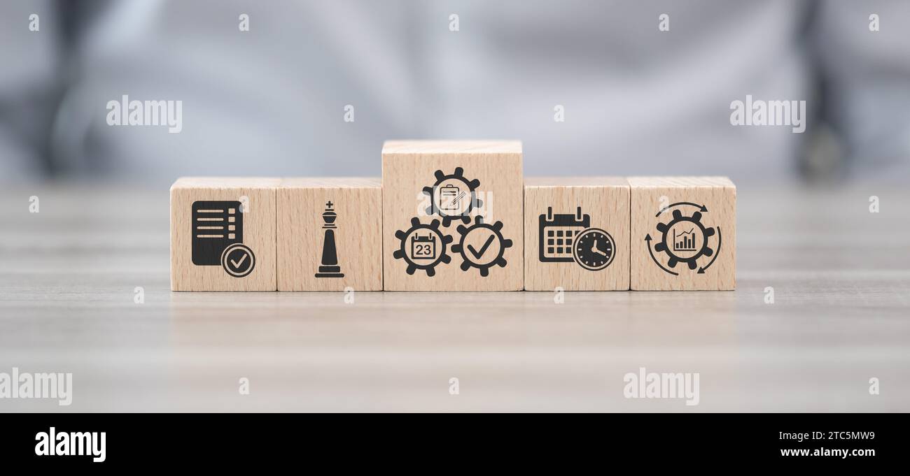 Wooden blocks with symbol of action plan concept Stock Photo - Alamy