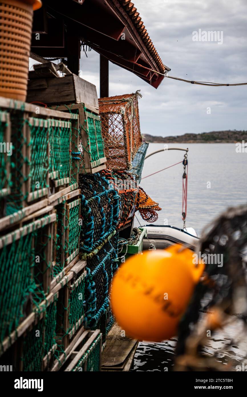 A close-up of a buoy with a line of fishing nets Stock Photo - Alamy