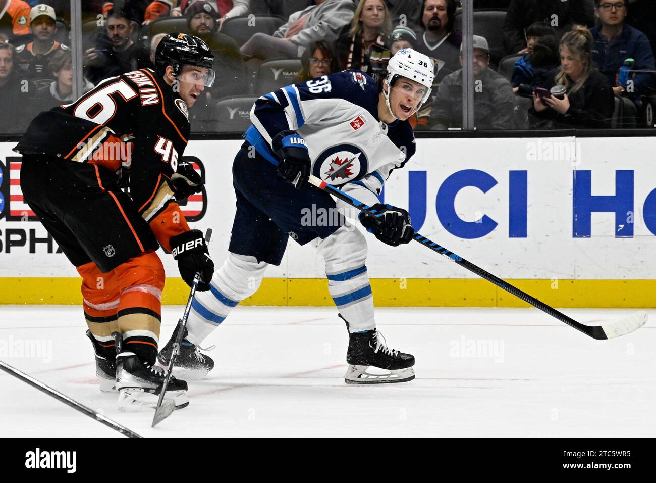 Winnipeg Jets center Morgan Barron (36) watches his shot with Anaheim ...