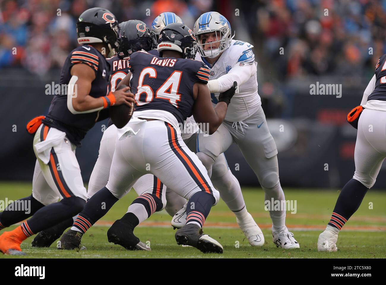 Chicago Bears guard Nate Davis (64) blocks Detroit Lions defensive end ...