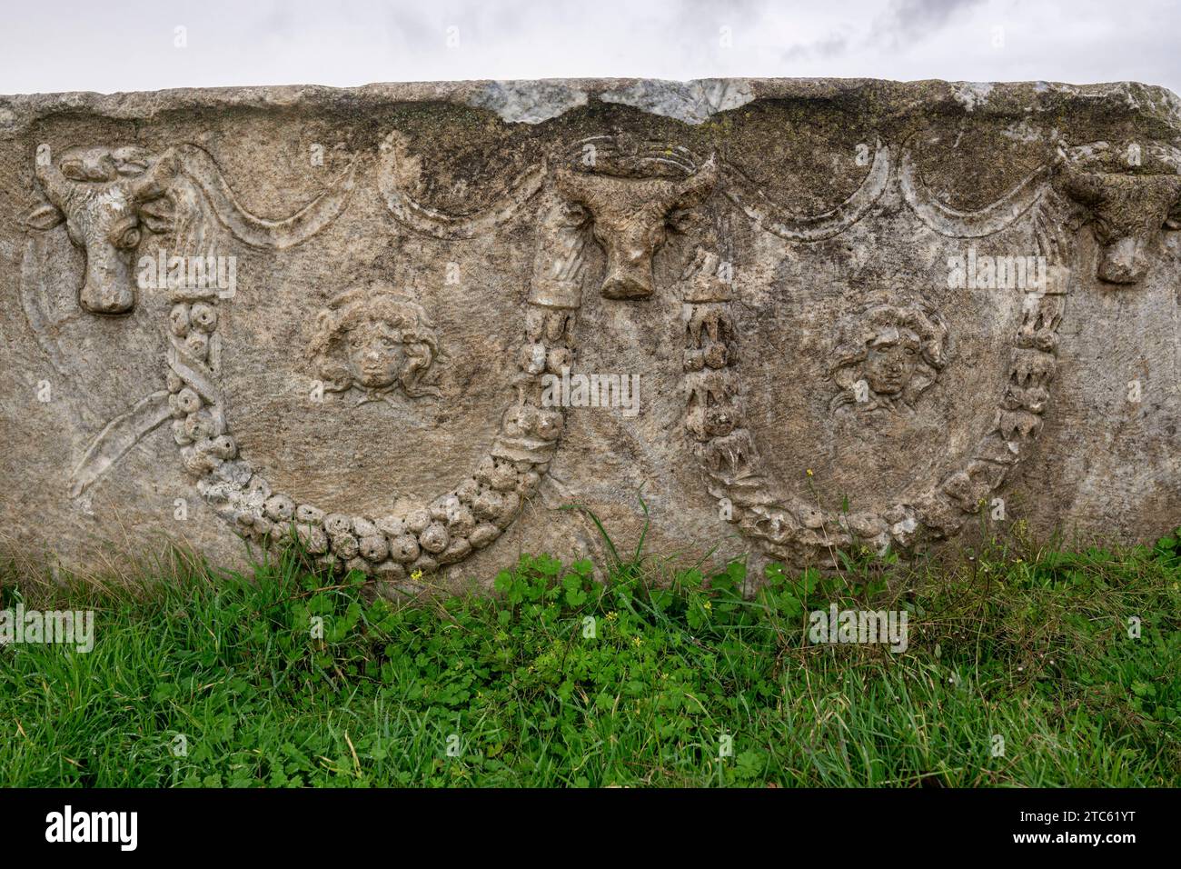 View of a funerary stele with depictions of a bull and flowers at ...