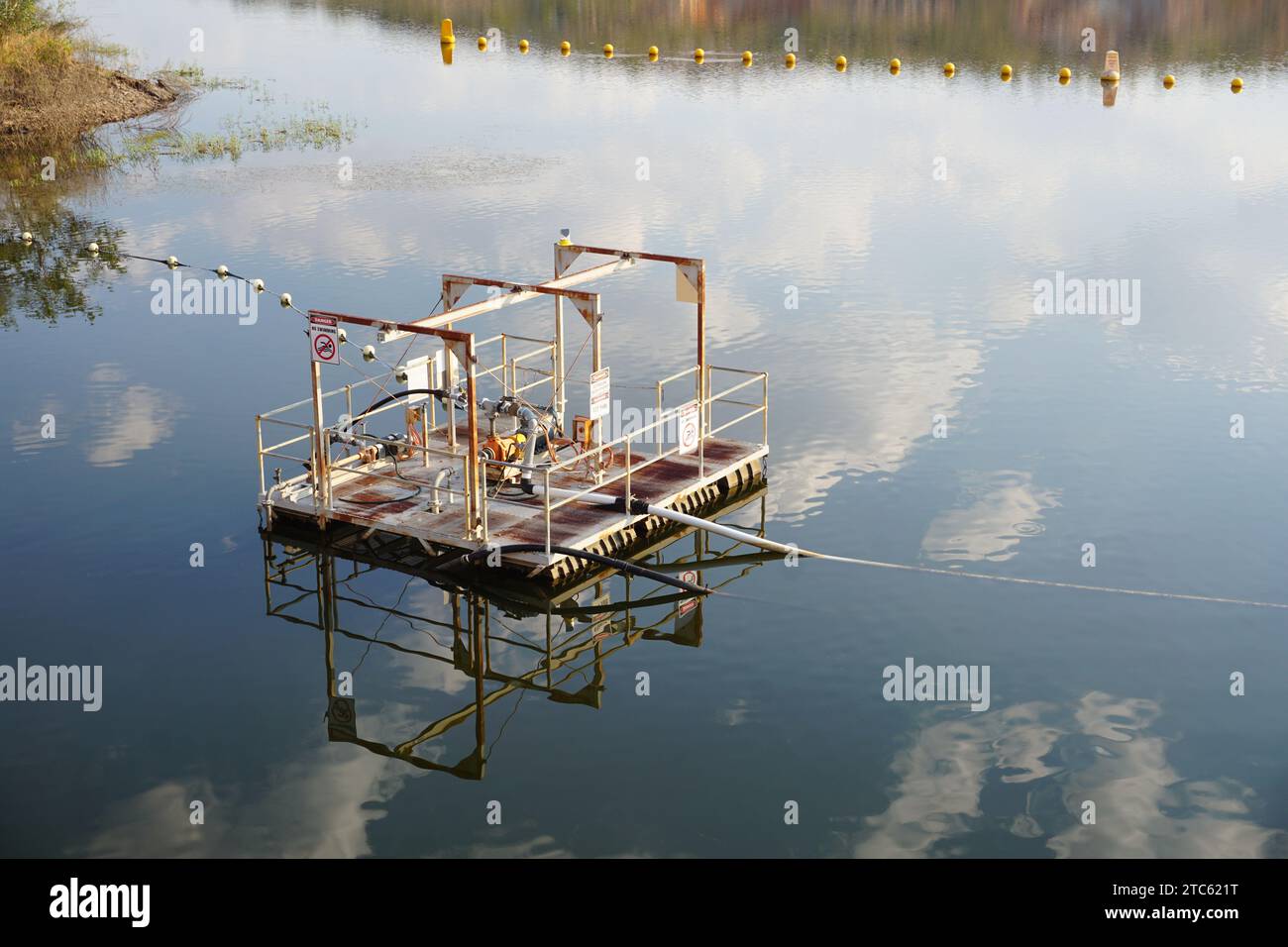 Floating water pump station dock at Lake Moondarra Dam, Mt Isa ...