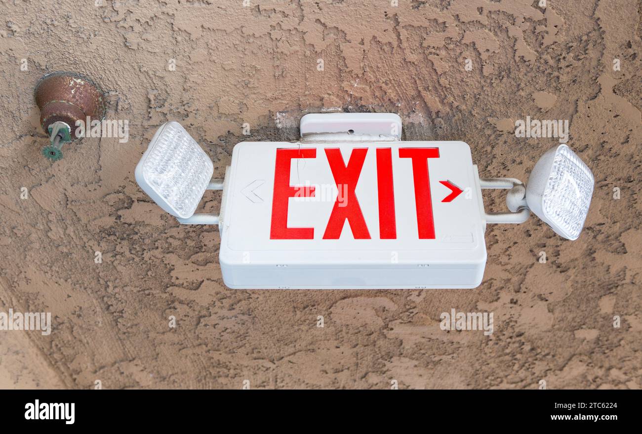 Exit sign with emergency light and fire extinguishing system in the ...