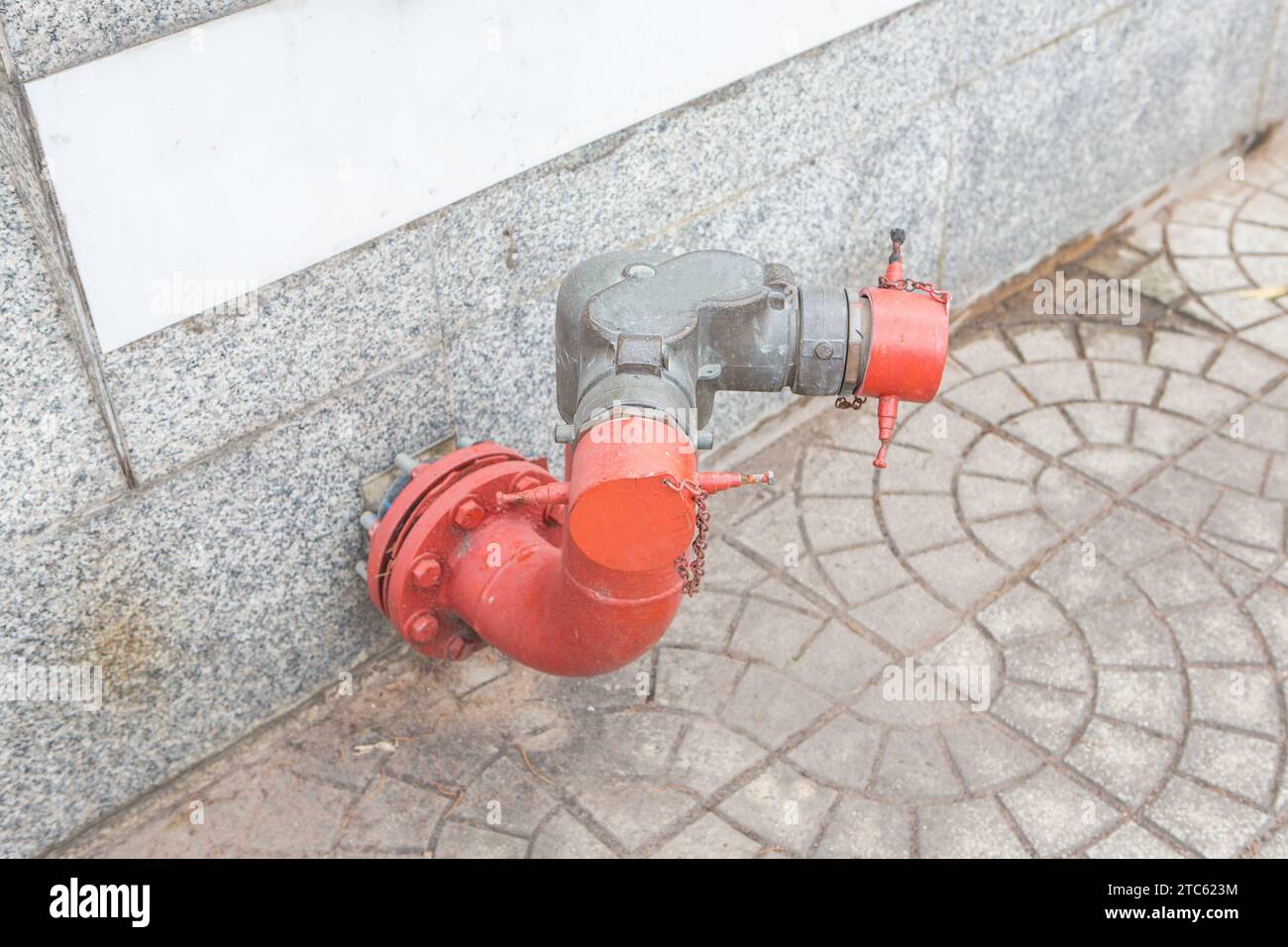 red fire hydrant on sidewalk Stock Photo - Alamy