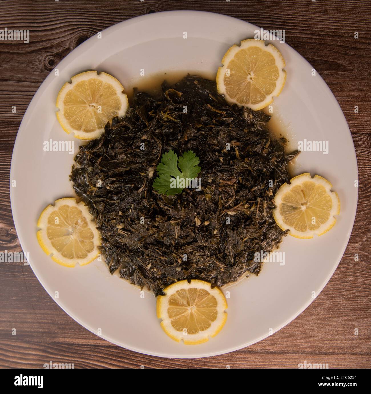 Lebanese recipe Mouloukhia , Melokhiyah, corete leaf, coriander, rice ...