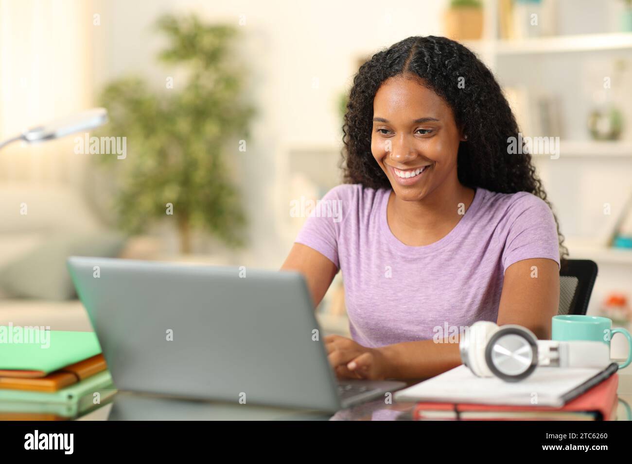 African teenager computer typing hi-res stock photography and images ...