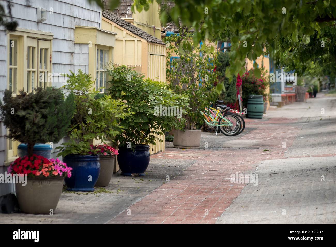 A quaint small town, with traditional paved streets winding through ...