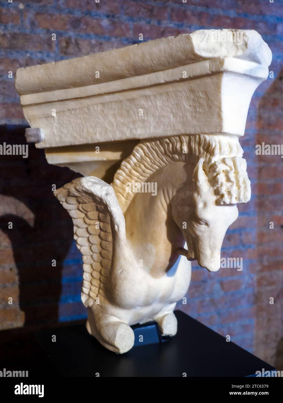 Fragment of figured Corinthian capital with winged horses (Pegasi ...