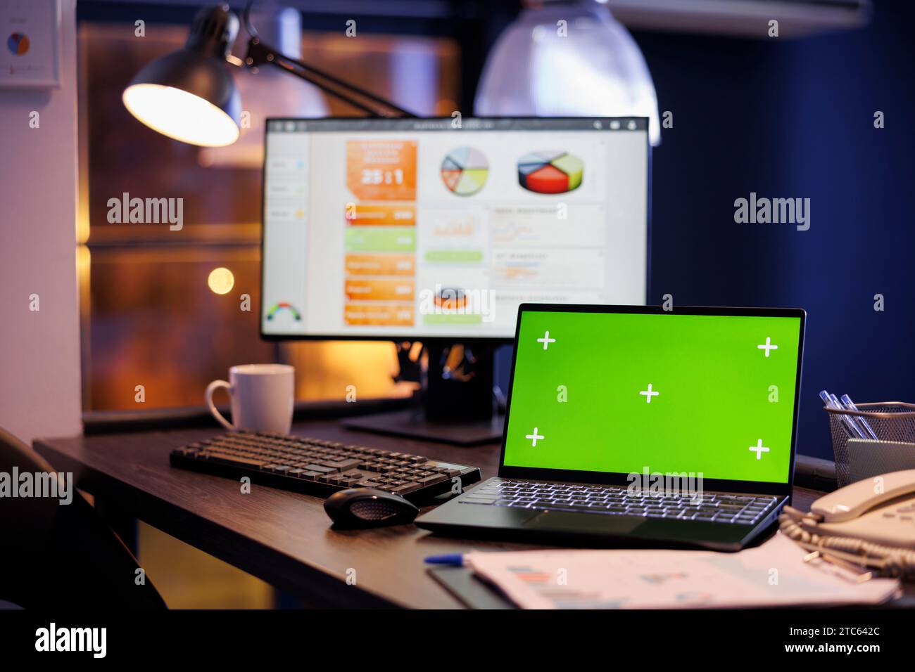Empty business office with green screen chroma key mock up laptop ...