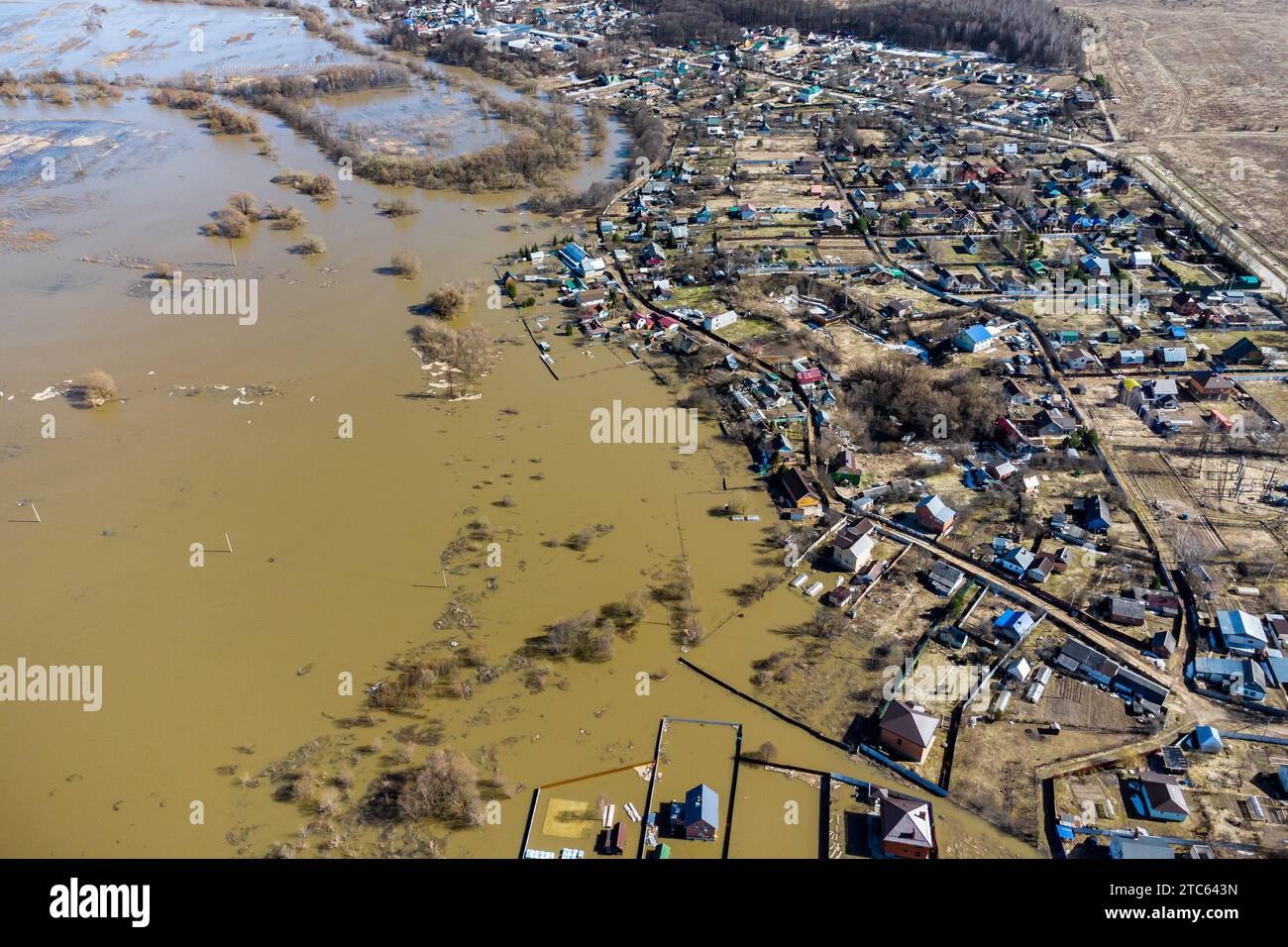 Aerial view of village areas with houses flooded during a rural spring ...