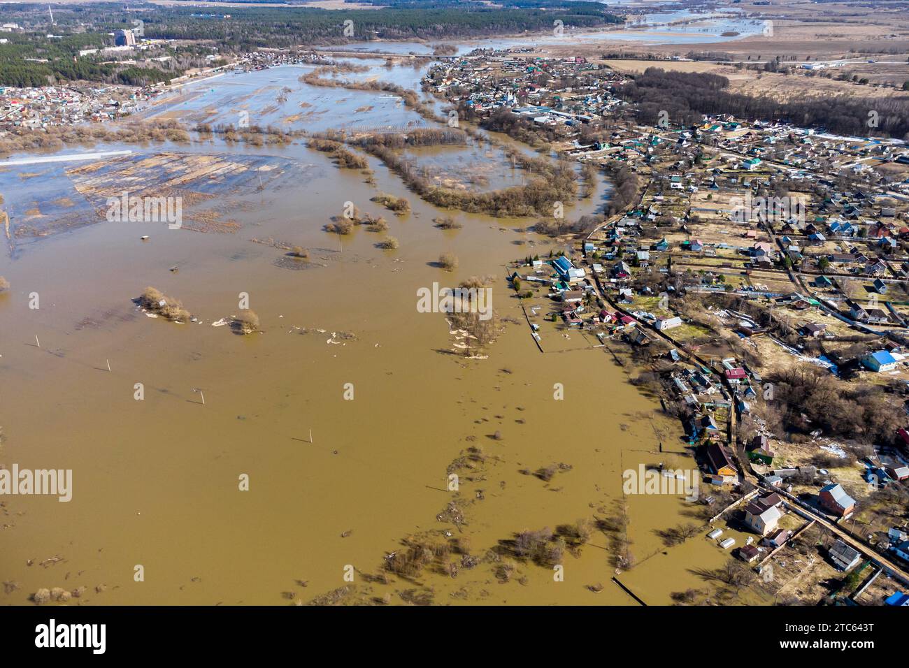 Aerial view of village areas with houses flooded during a rural spring ...