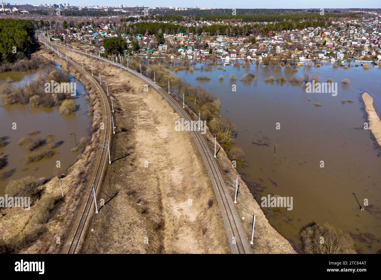 Aerial view of a railway running through a flooded countryside during ...