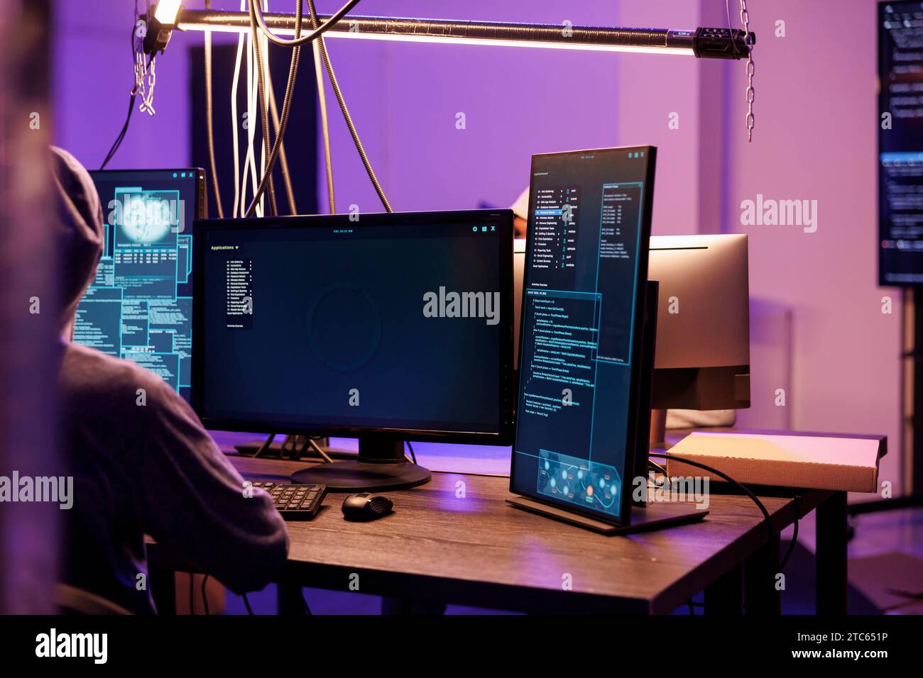 Hacker Running Malware Code And Launching Ransomware On Computer Screen Criminal Working With