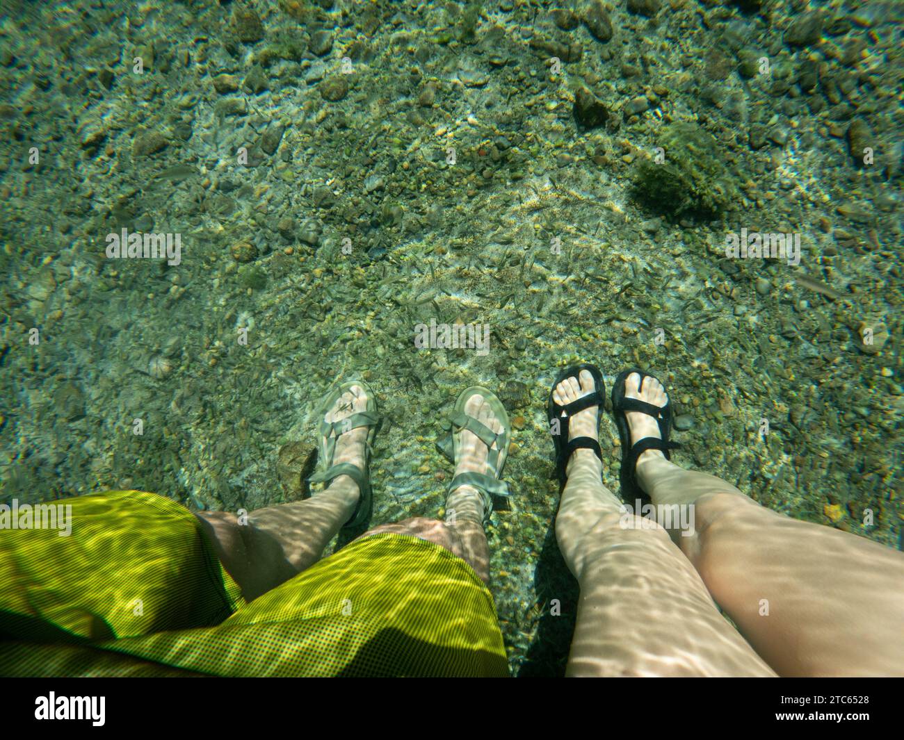 Feet over shallow water hi-res stock photography and images - Alamy
