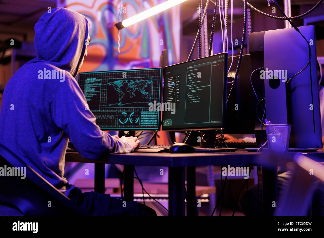 Internet Criminal Hacking Computer Network System And Running Ransomware Code On Screen Man In