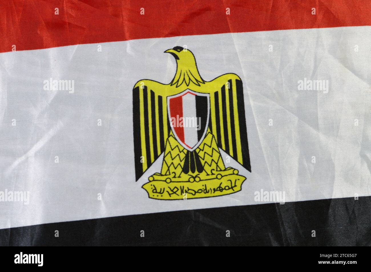 The national flag of Egypt, a tricolour consisting of the three equal ...
