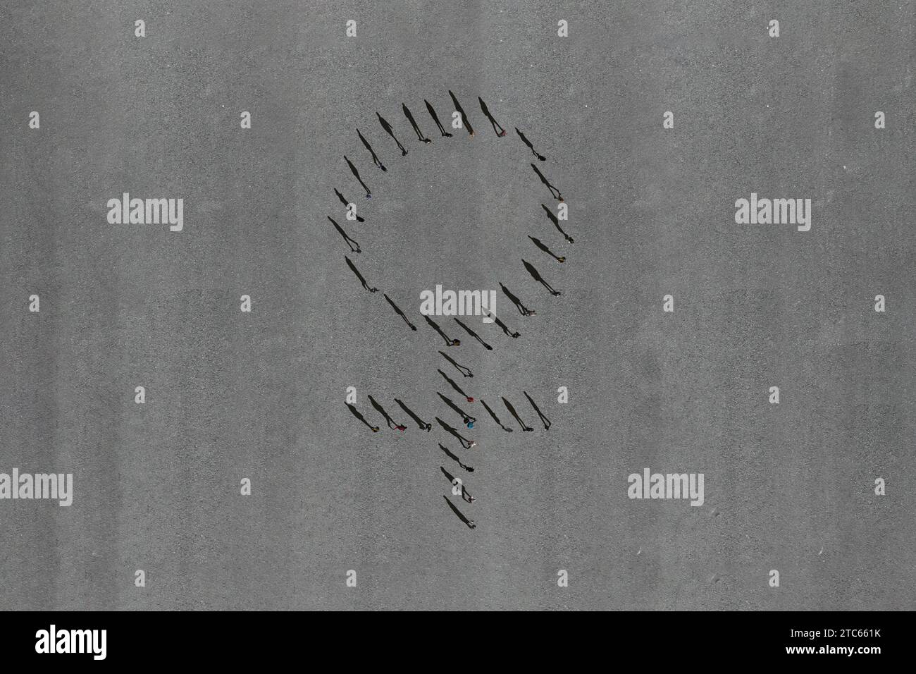 Diverse group of people forming a female sign ♀ to represent women all ...