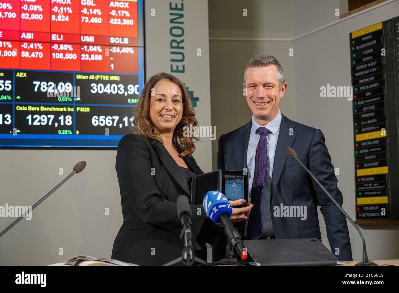 Brussels, Belgium. 11th Dec, 2023. Syensqo CEO Ilham Kadri and NYSE Euronext Brussels CEO Benoit ...