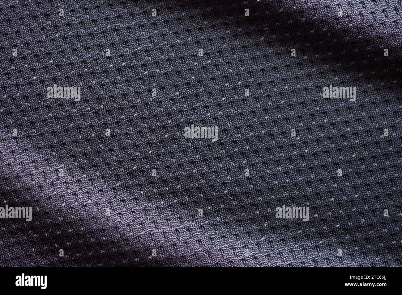 Black fabric sport clothing football jersey with air mesh texture ...