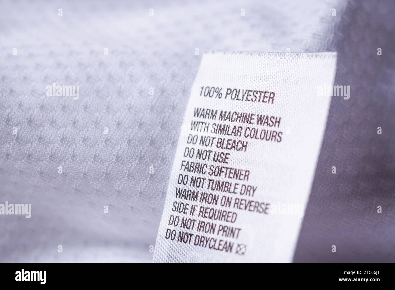 Polyester fabric Clothing label with laundry instructions Stock Photo ...