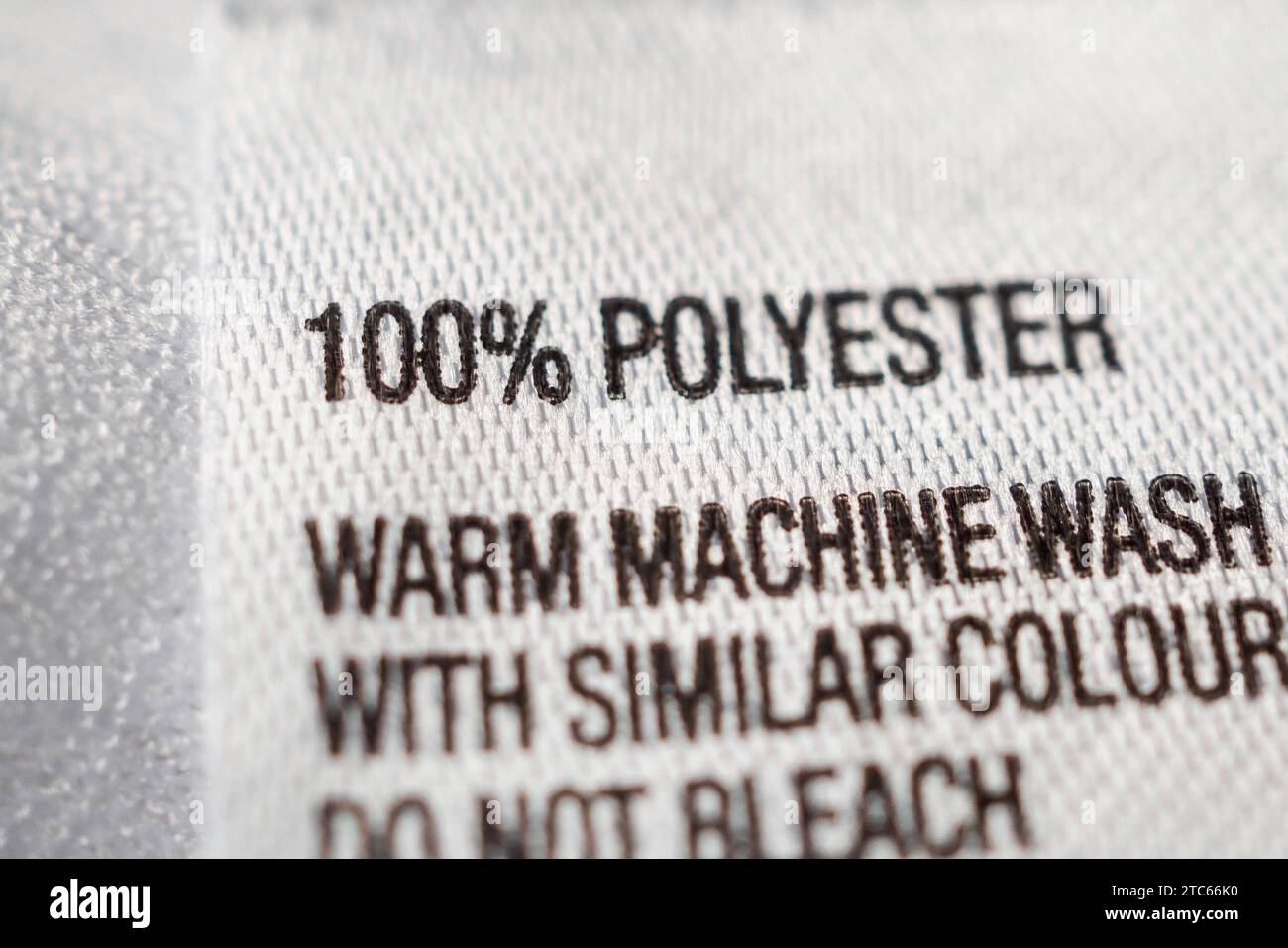 Polyester fabric Clothing label with laundry instructions Stock Photo ...