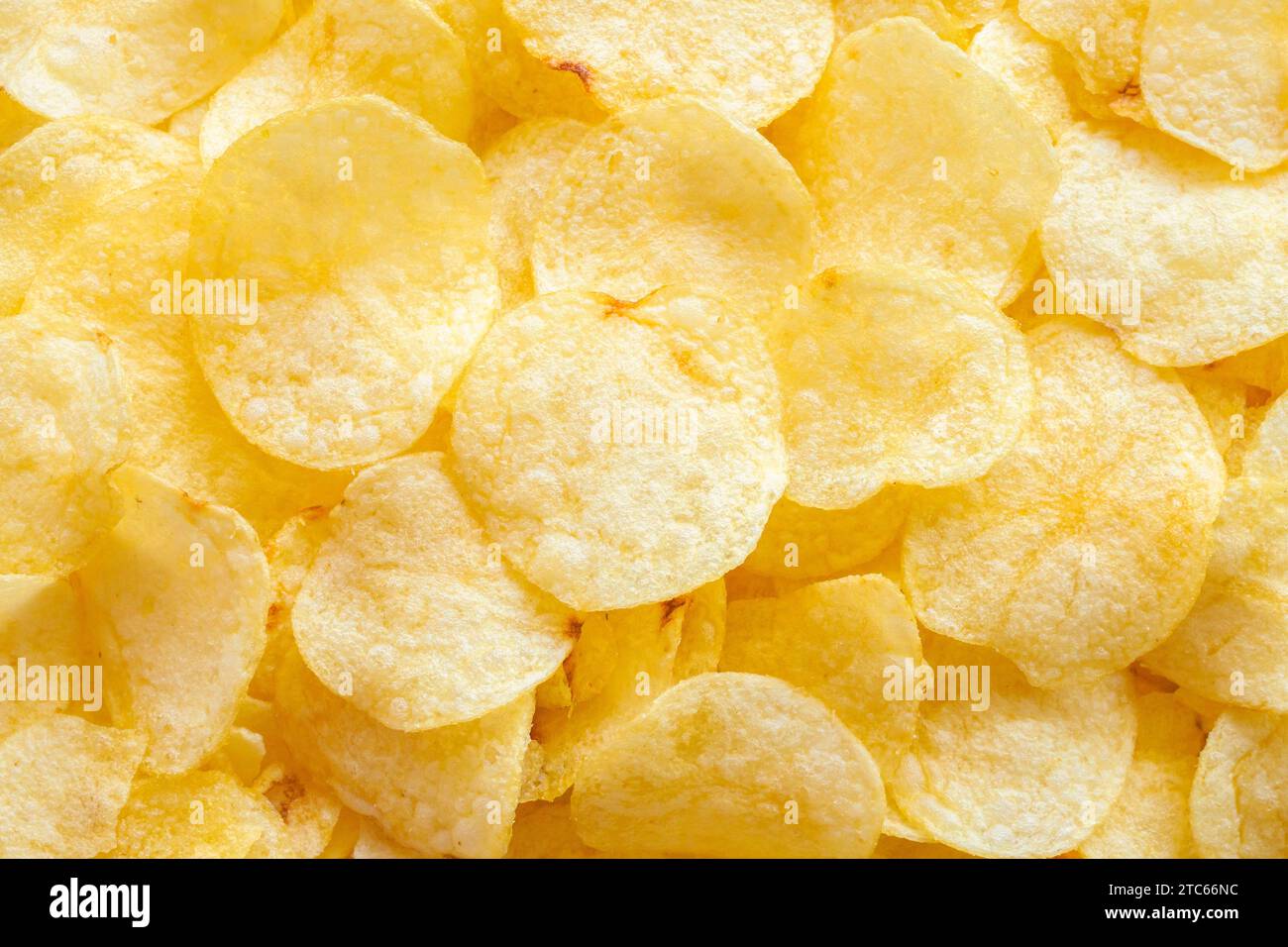 crispy potato chips snack texture background Stock Photo - Alamy