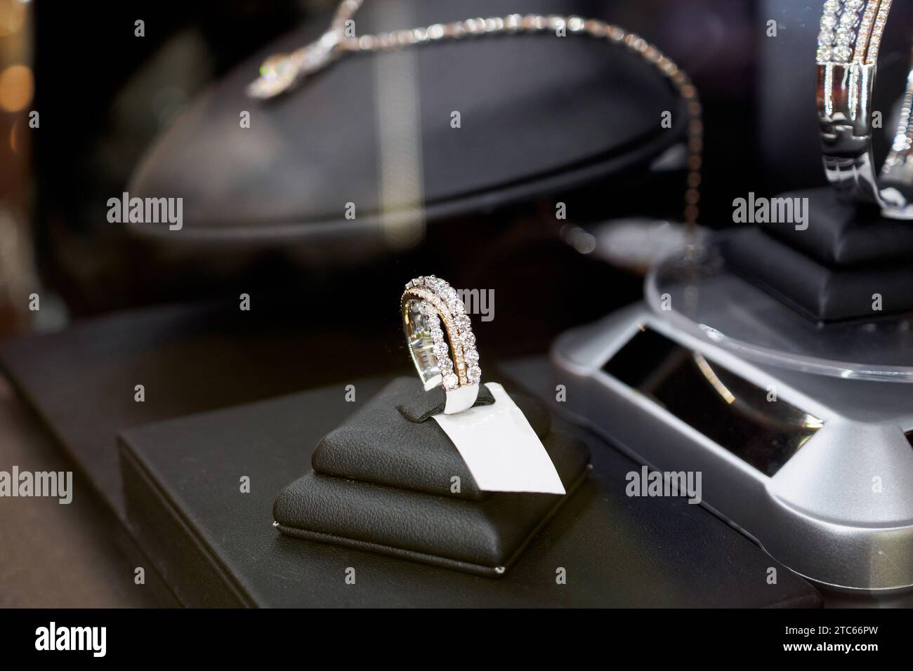 Diamond rings with blank price tag show in jewelry luxury store window ...