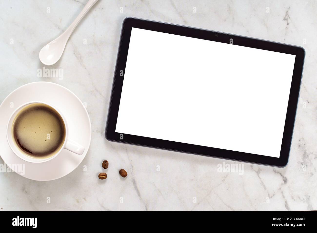 Mockup with tablet and coffee cup. Coffee break during work concept ...