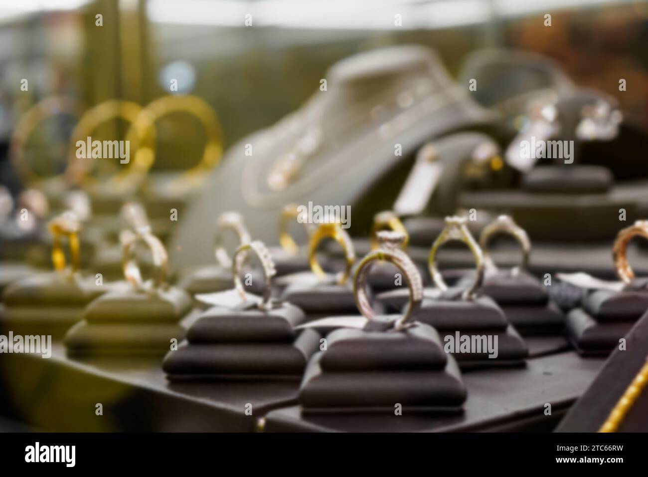 Jewelry diamond rings and necklaces show in luxury retail store window ...