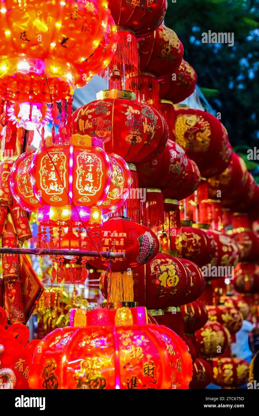Many red lanterns with vietnamese language translated as "Happy New ...
