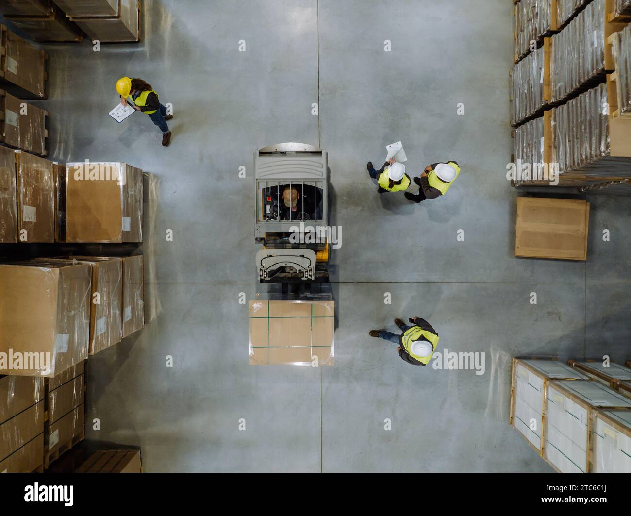 Top view of forklift in a modern warehouse storage of retail shop ...