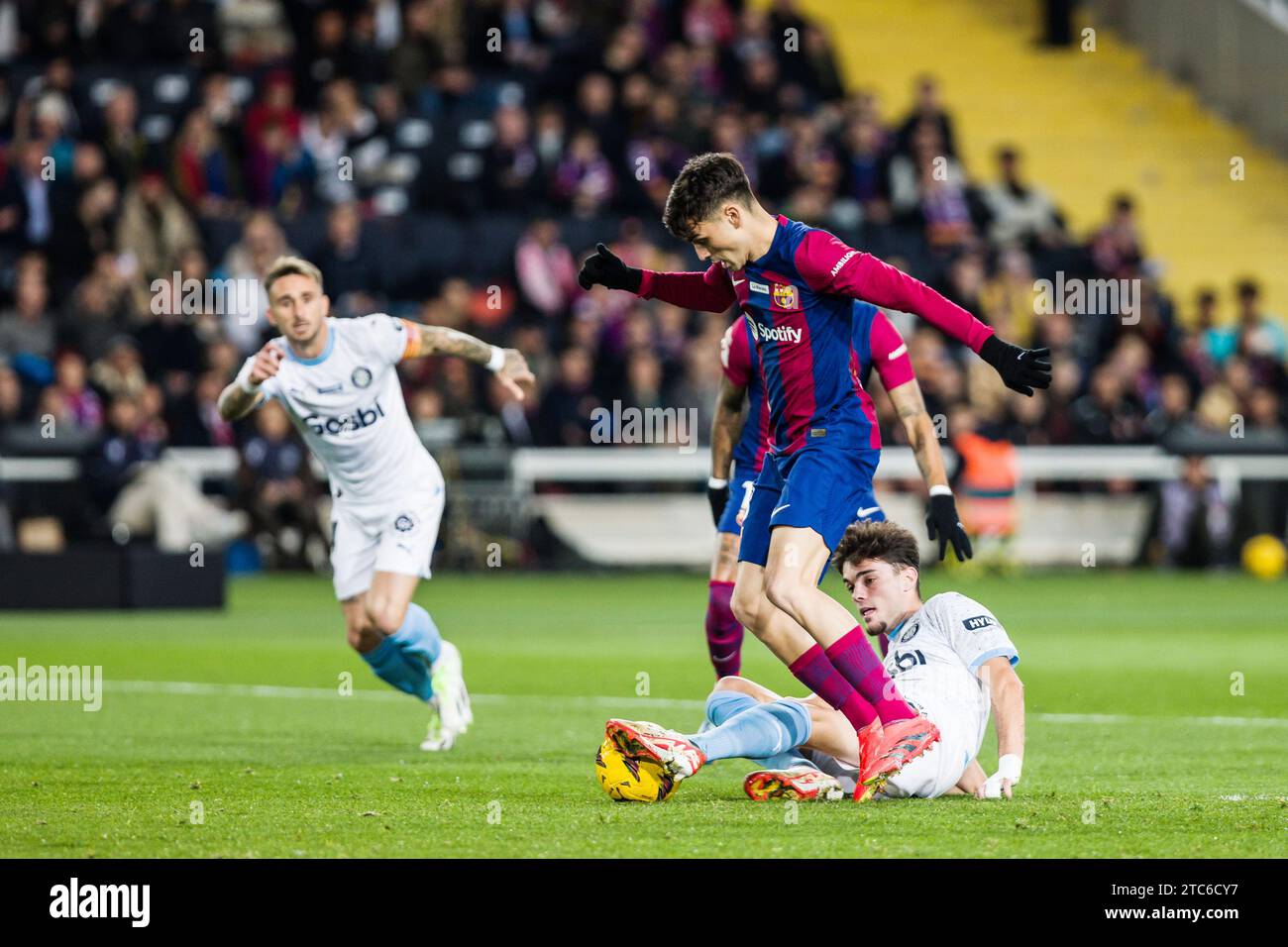 Pedri Gonzalez of FC Barcelona in action against Miguel Gutierrez of Girona FC during the ...