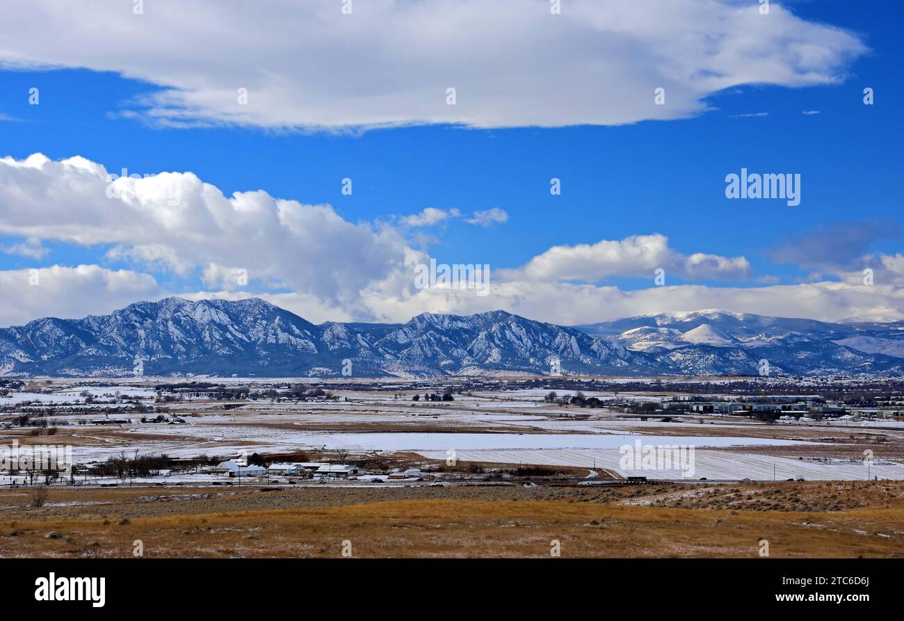 the striking boulder flatirons and snow -capped peaks of the front ...