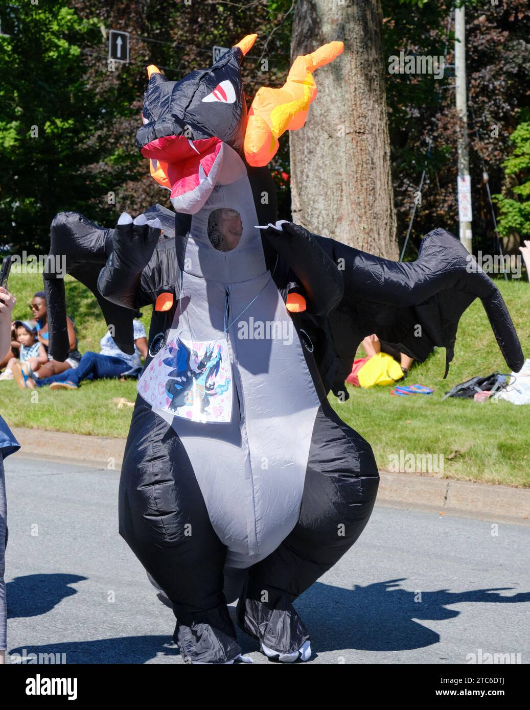 Pokemon dragon walking in street parade Stock Photo - Alamy
